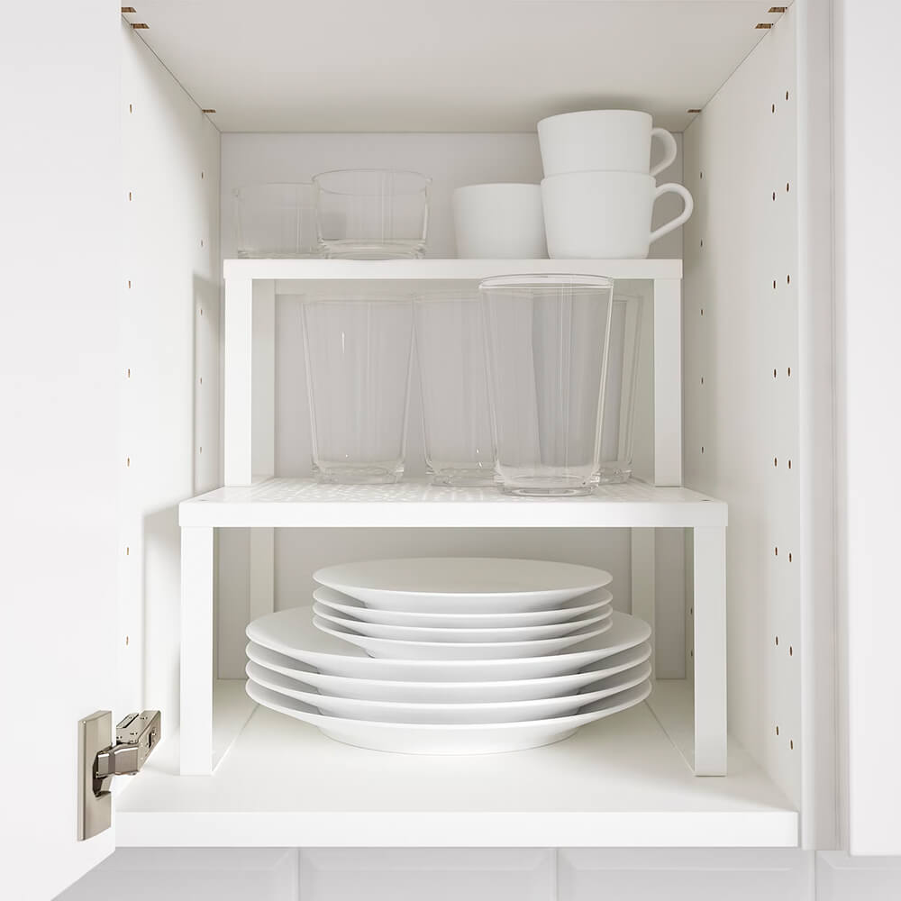 9. Use Shelf Risers to Maximise Cabinet Space